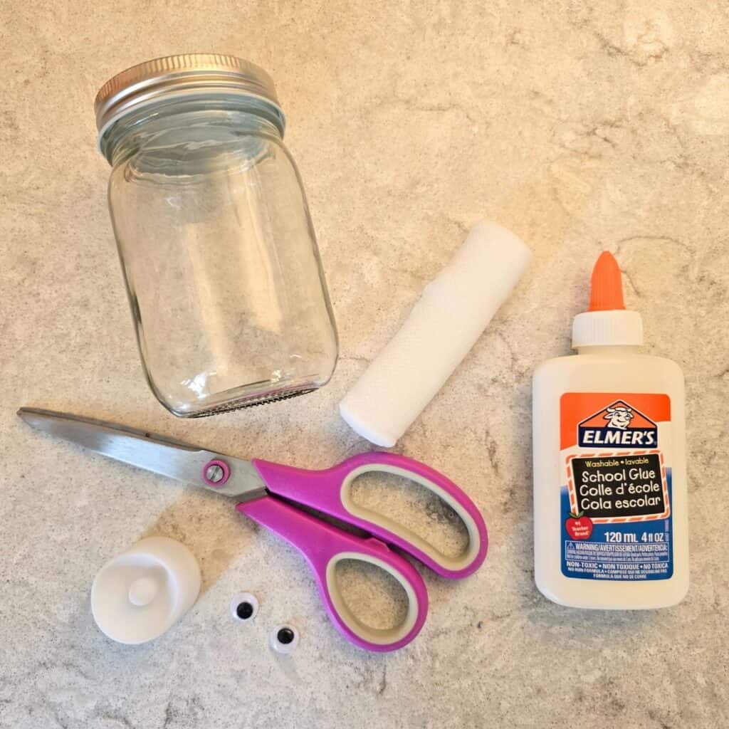 Quick DIY Halloween Ghost Mason Jars That Bring a Cozy Glow